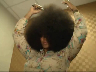 Aevin Dugas Sets Guinness Record for World's Largest Afro - The ...
