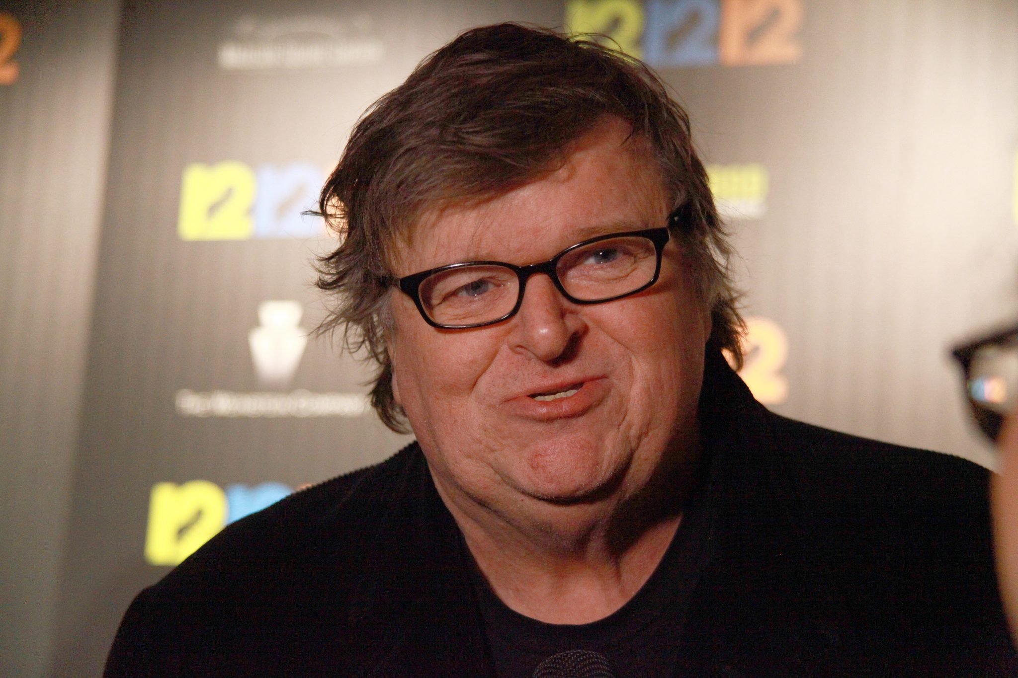 Michael Moore Refers to Snipers as "Cowards," Sparks Major Backlash ...