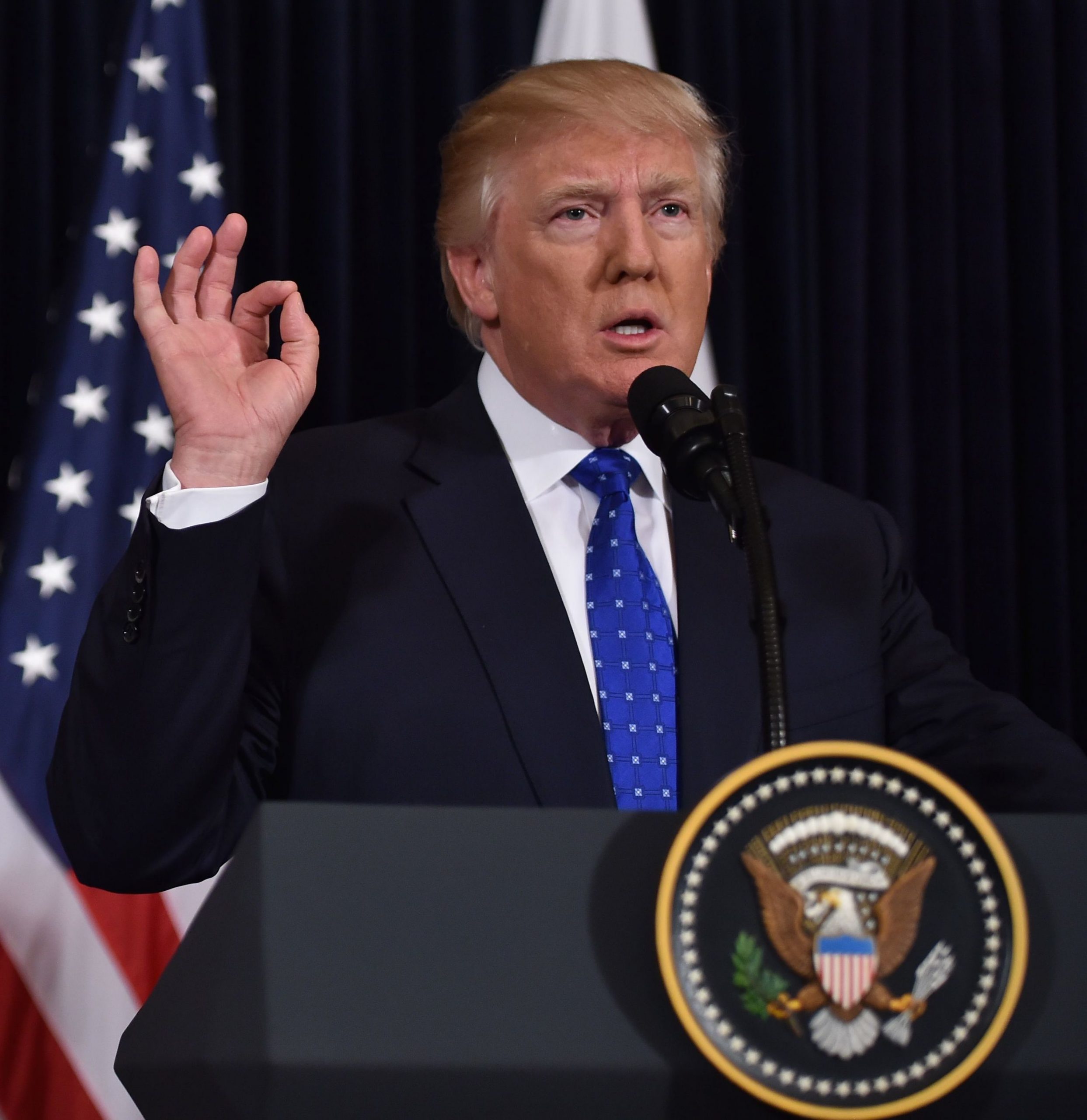 Donald Trump at the Lectern - The Hollywood Gossip