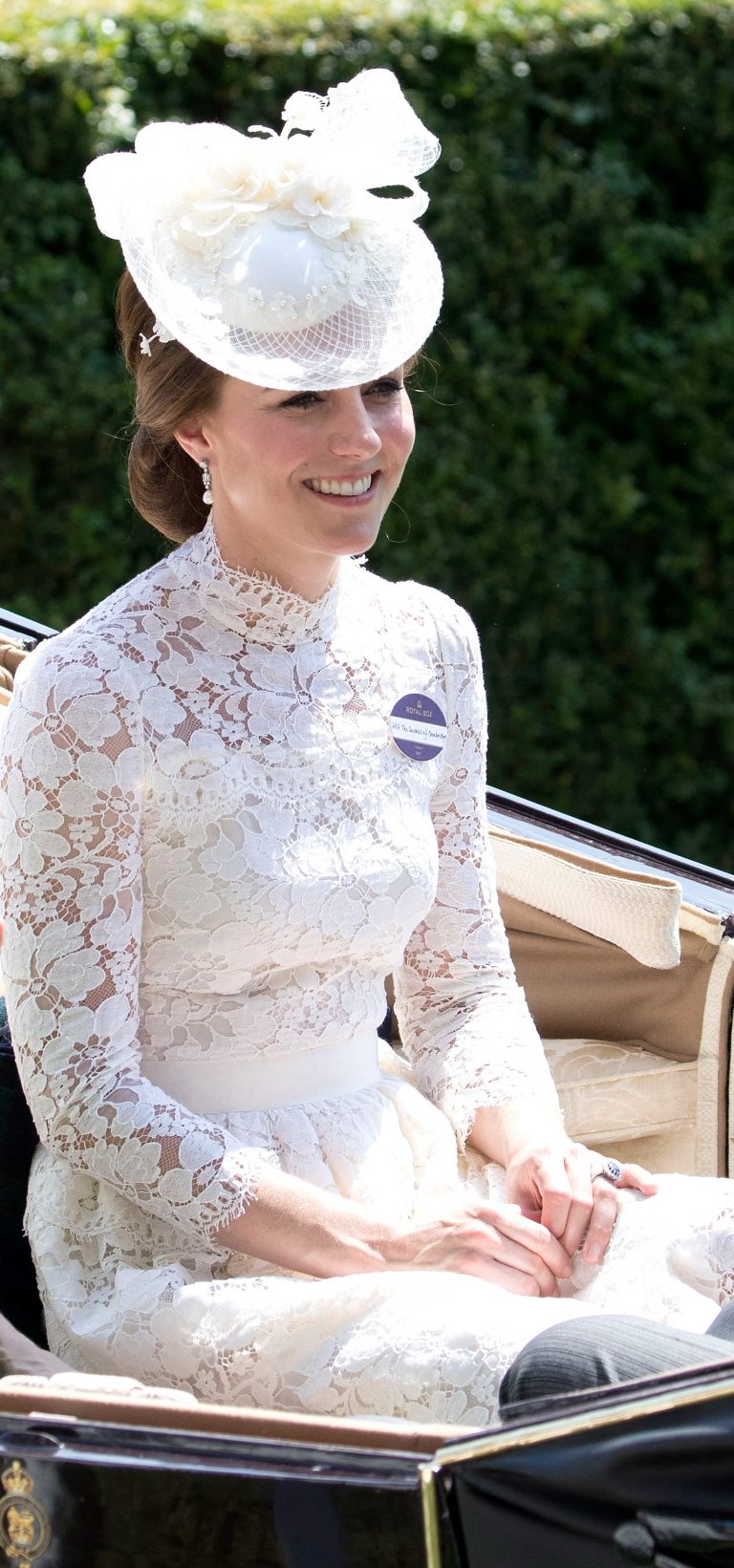 Kate Middleton Sitting in White - The Hollywood Gossip