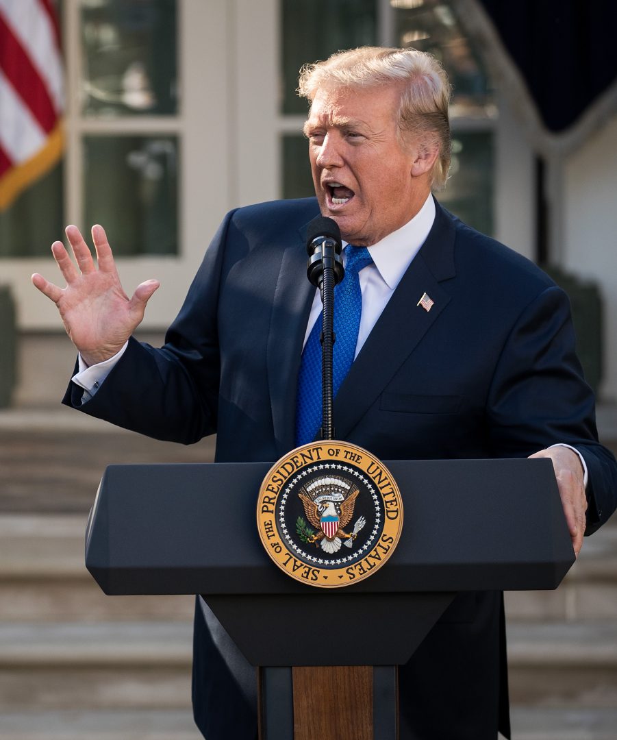 Donald Trump at a Lectern - The Hollywood Gossip