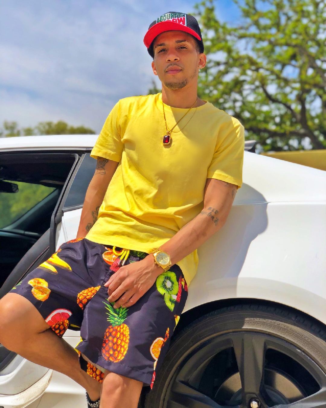 Martell Derouen in pineapple shorts - The Hollywood Gossip