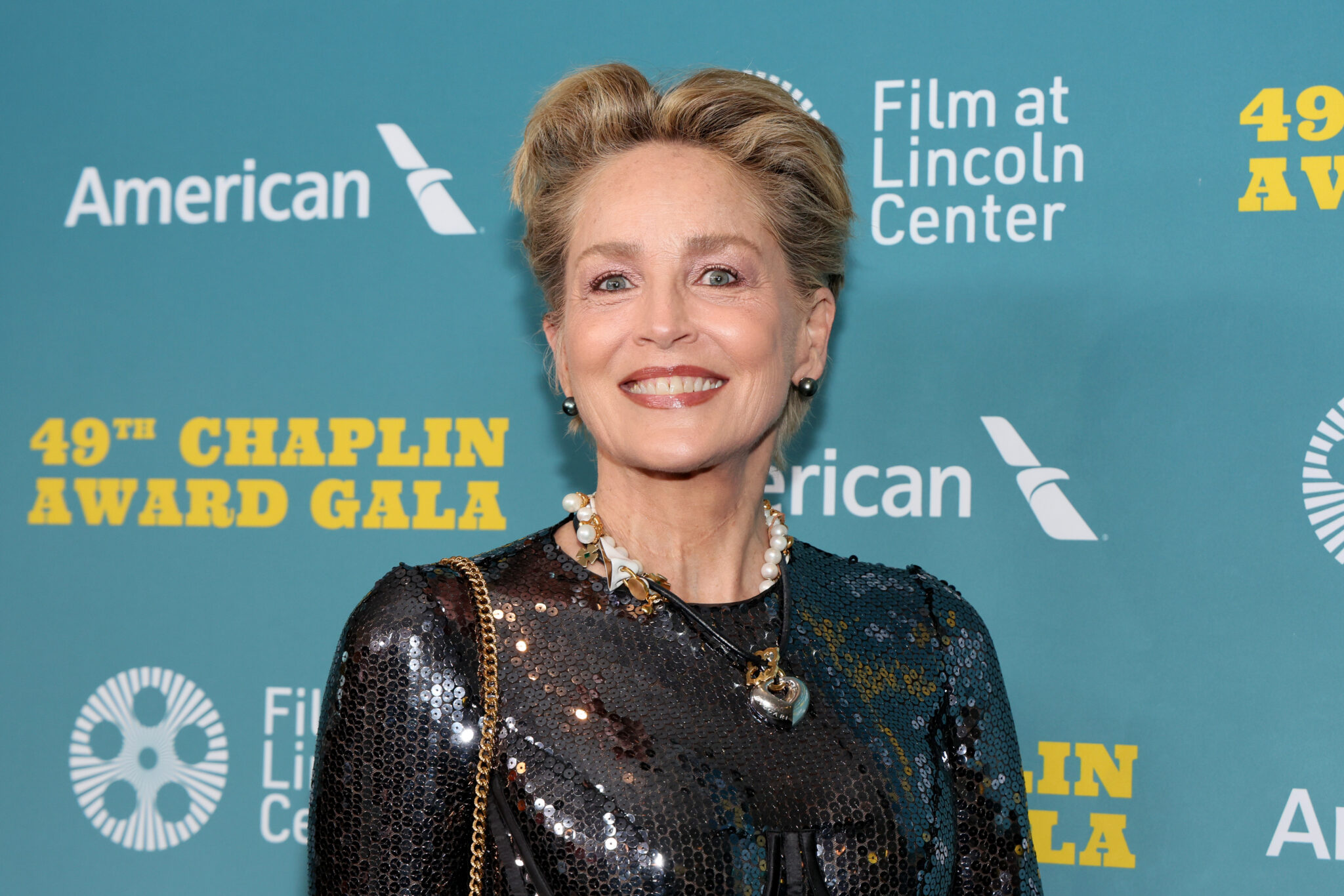 Sharon Stone Reenacts THAT 'Basic Instinct' Moment