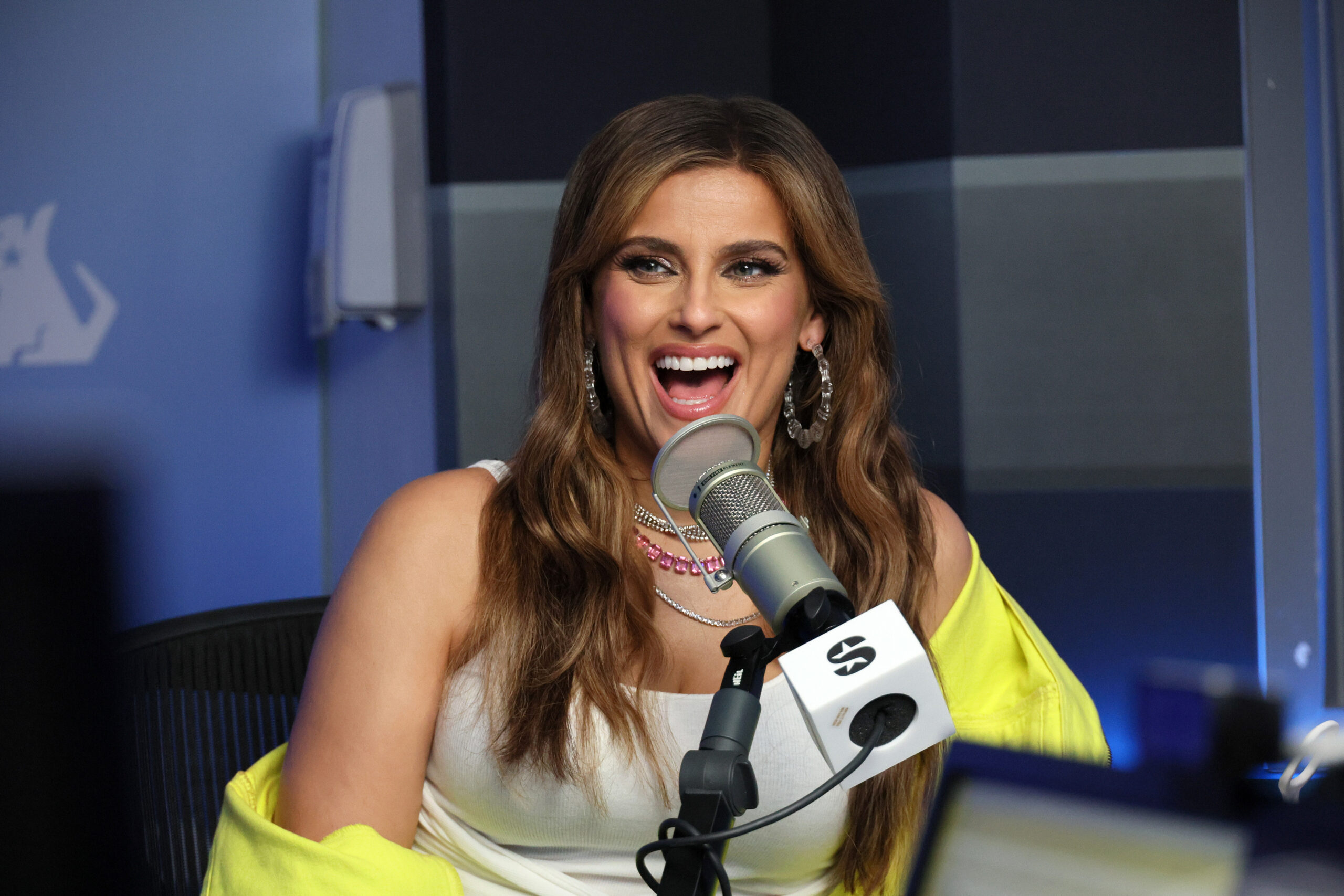 Nelly Furtado Debunks Surgery Claims with Bombshell Bikini Pics