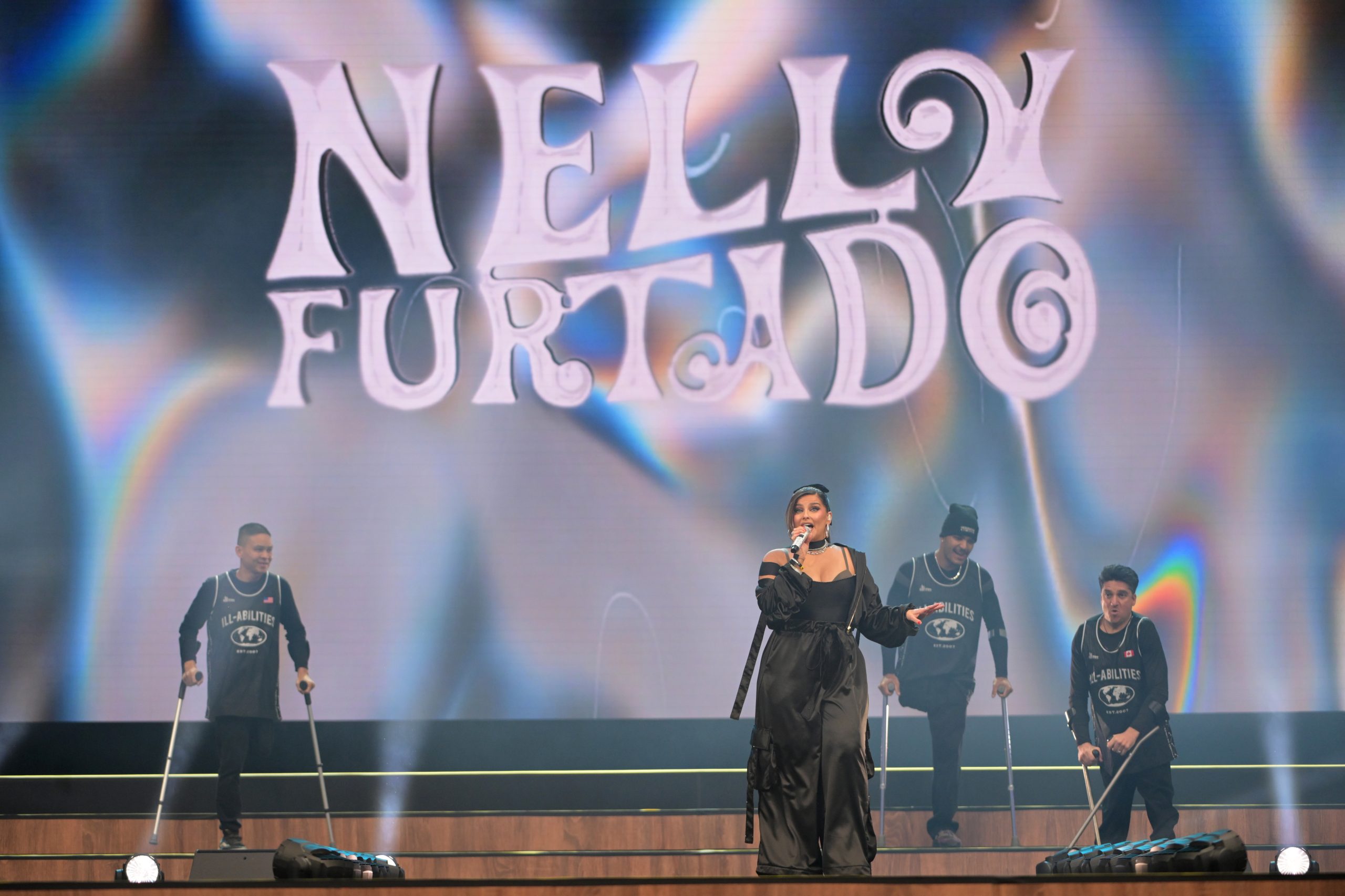Nelly Furtado Claps Back at Body-Shamers with Fun Throwback