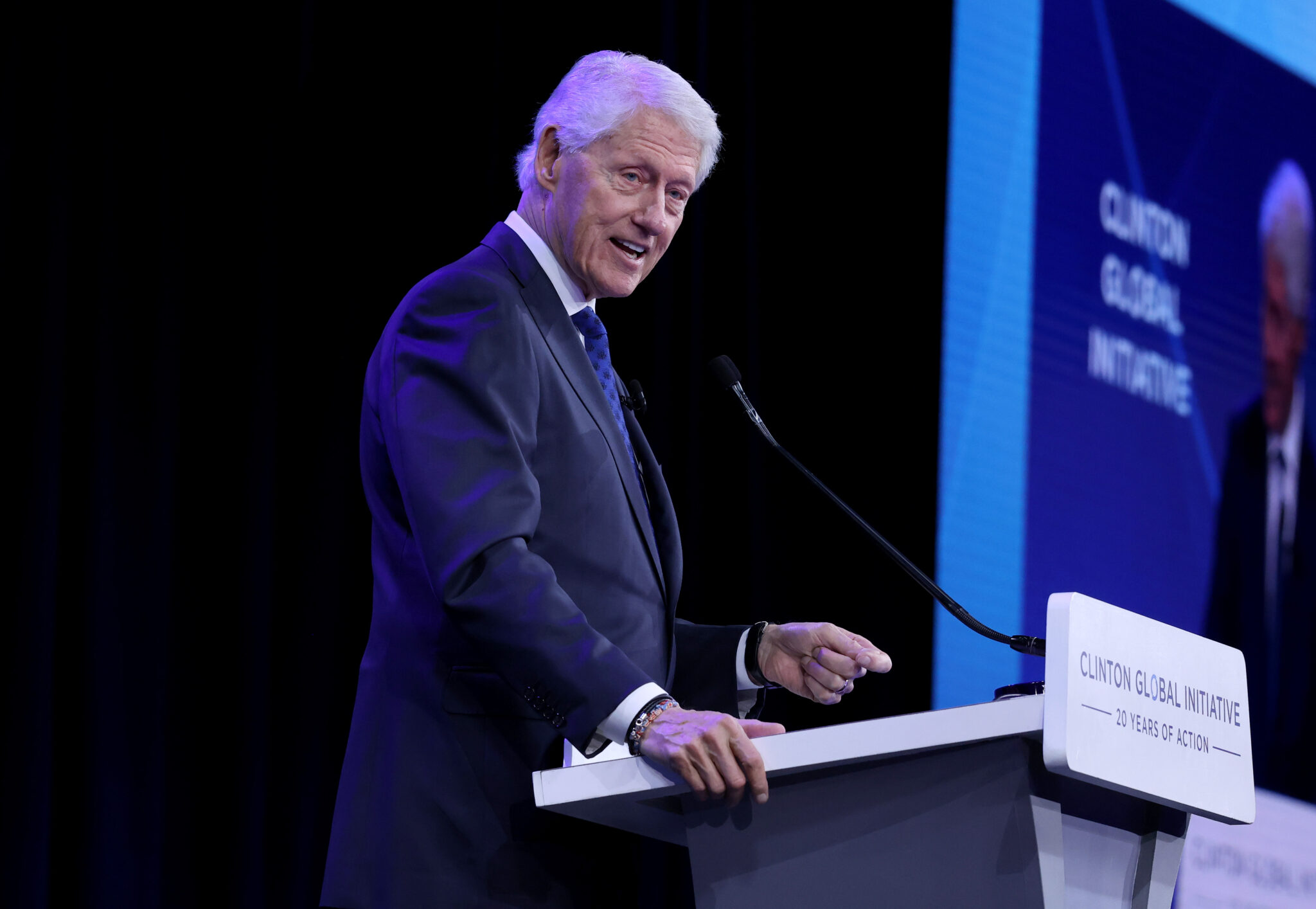 Bill Clinton Grins, Chuckles at Photo During Epstein Testimony